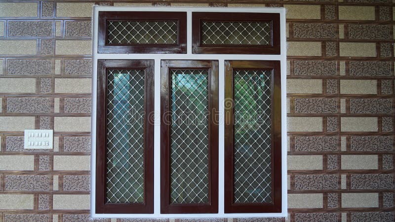 Beautiful Window Fence Fitted in Wall. Stylish Modern Building Window ...