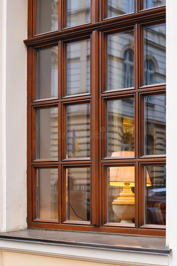 Beautiful Window and Turn on Lights in the Window Stock Photo - Image ...