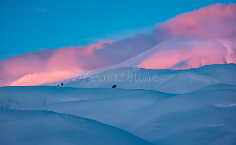 Beautiful Winter Sunset on Snow Hills with Pink Colored Clouds Stock ...