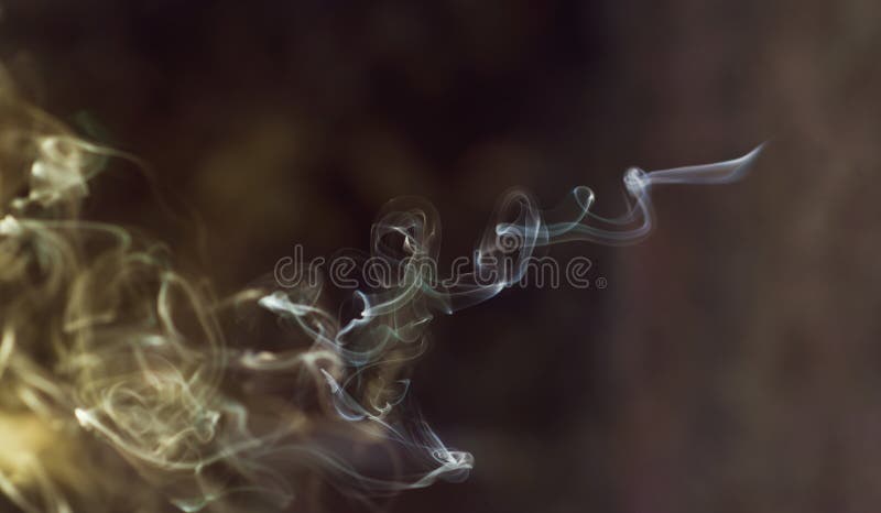 A Beautiful Wisp of Smoke Dissipates into the Air. a Lot of Smoke at ...