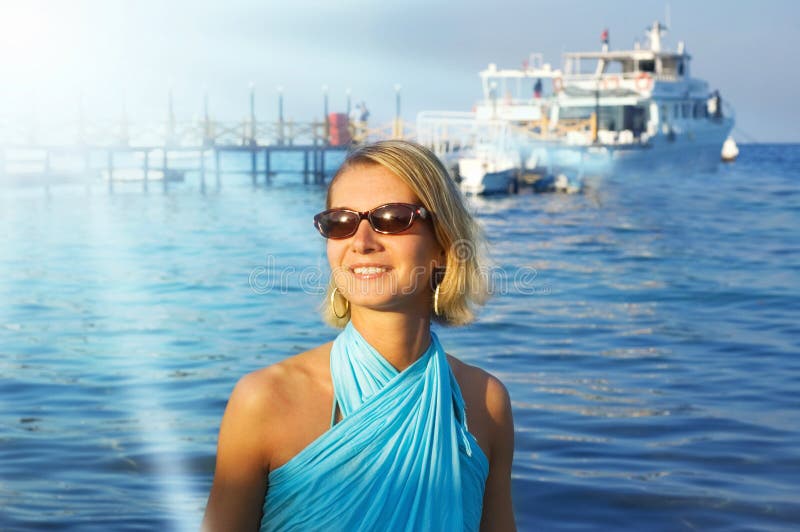 Beautiful Young Blond Woman Driving a Speedboat Stock Photo - Image of ...