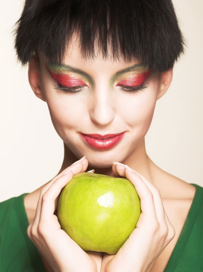 Beautiful woman with apple stock photo. Image of natural - 39959108