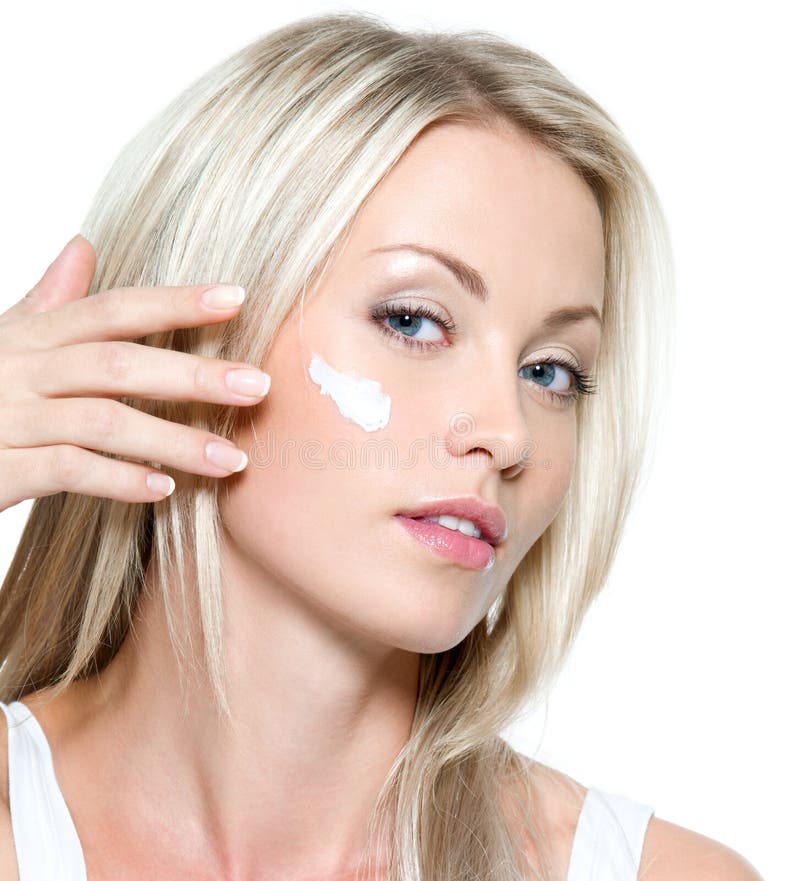 Beautiful Woman Applying Cream Stock Image - Image of attractive, adult ...