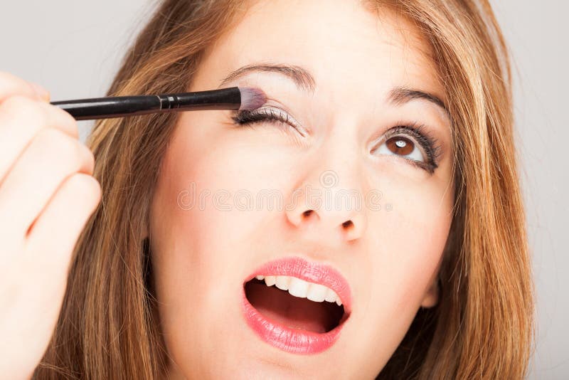 Beautiful Woman Applying Eye Shadow Stock Photo - Image of nice, care ...