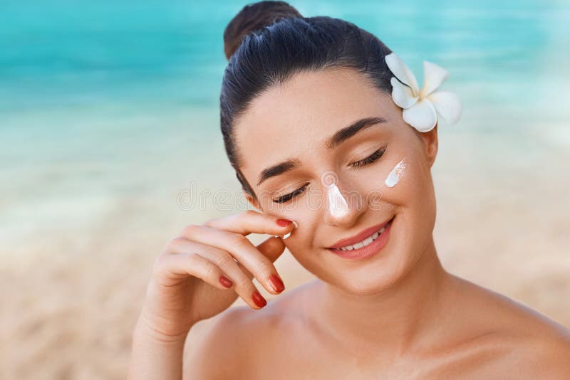 Beautiful Woman Applying On Face Sunscreen Solar Cream Skin Care
