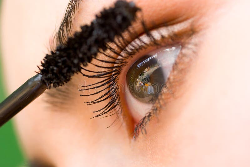 Beautiful Woman Applying Mascara on Her Eye Stock Image - Image of ...