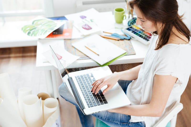 Beautiful Woman Artist Using Laptop in Workshop Stock Image - Image of ...