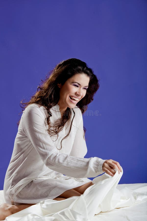 Beautiful woman on the bed stock image. Image of attractive - 60665085