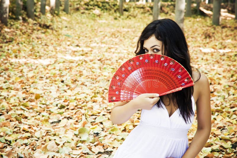 Beautiful Girl Hiding Behind A Fan Stock Image - Image of cooling ...