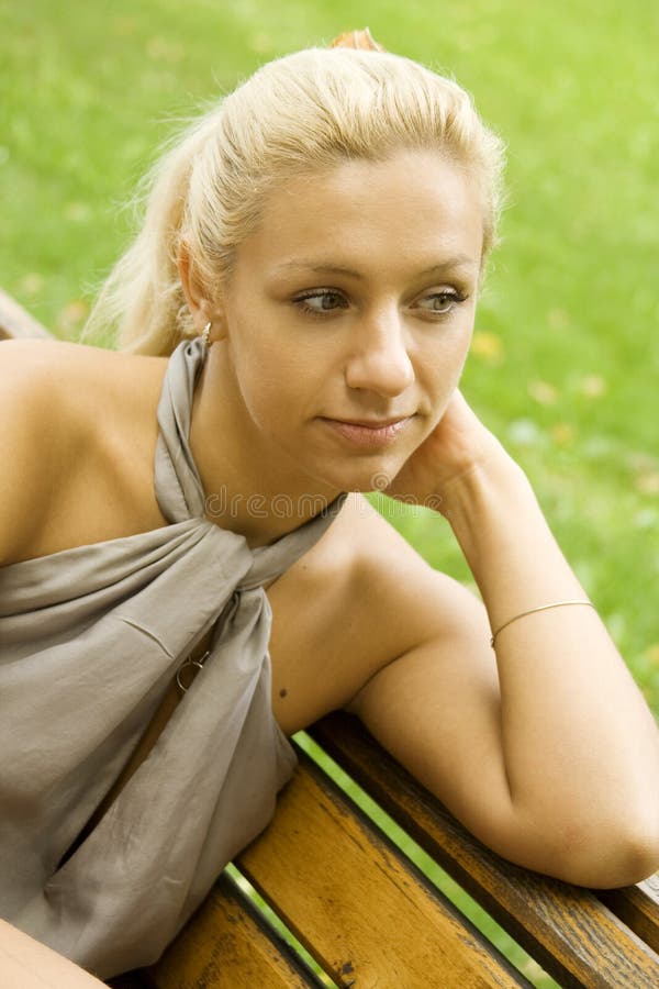 Beautiful Woman on the Bench Stock Image - Image of nature, bench: 33581045