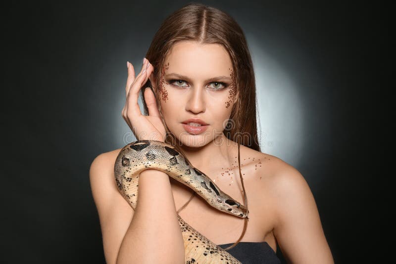 Beautiful Woman with Boa Constrictor on Background Stock Photo - Image ...