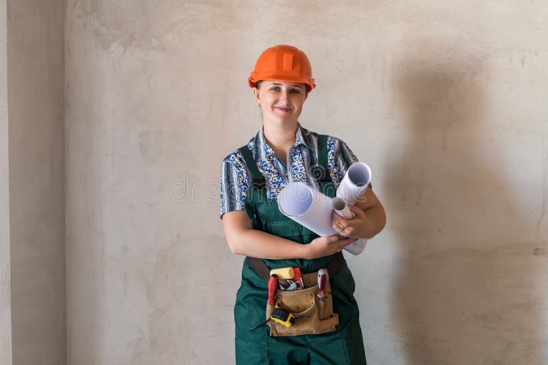 Beautiful Woman Builder Posing with Blueprints in Rolls Stock Image ...