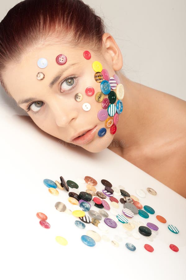 Beautiful Woman with Buttons on Her Face Stock Image - Image of ...