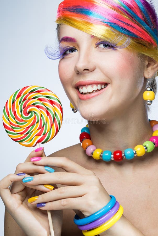 Woman with candy stock image. Image of lollypop, girl - 35334847