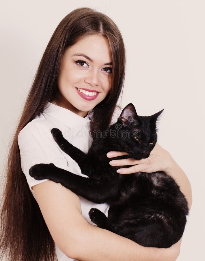 Beautiful woman with cat stock photo. Image of happy - 84097974