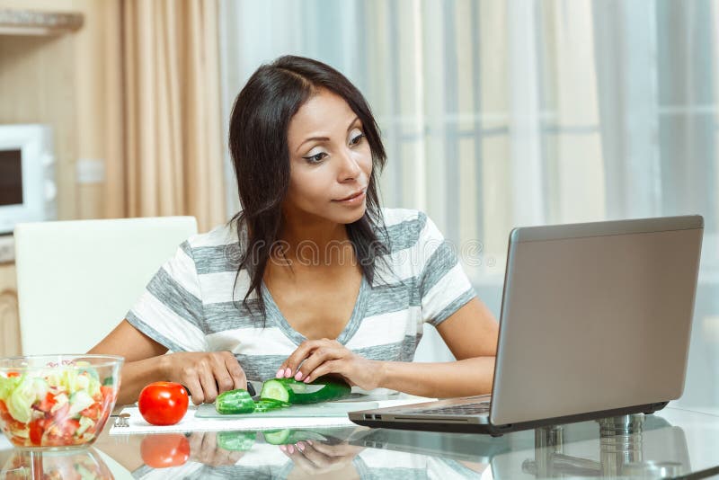 Beautiful Woman Checks Recipe Stock Photos - Free & Royalty-Free Stock ...