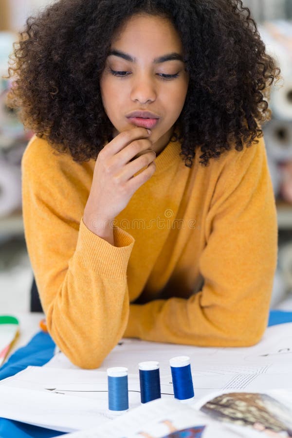 Beautiful Woman Choosing Thread in Workshop Stock Photo - Image of ...