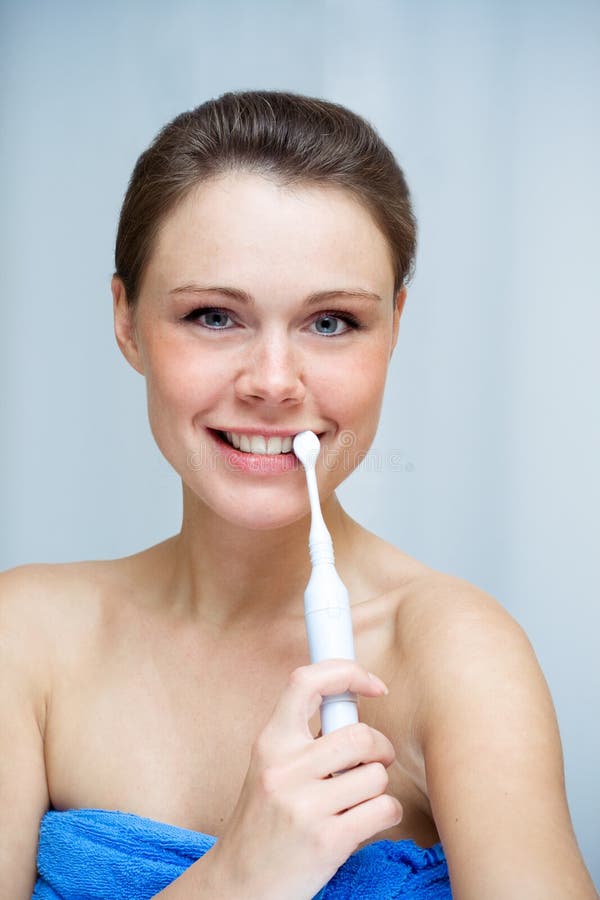 Beautiful Woman Cleaning Her Teeth by Toothbrush Stock Photo - Image of ...