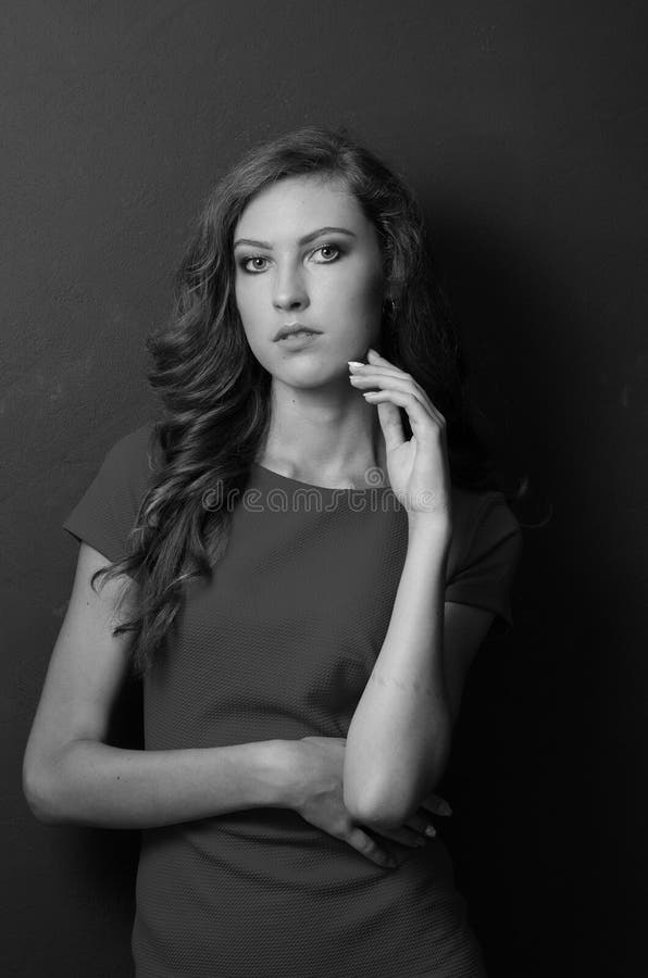 Beautiful Woman With Dark Hair And Evening Makeup Jewelry Beauty