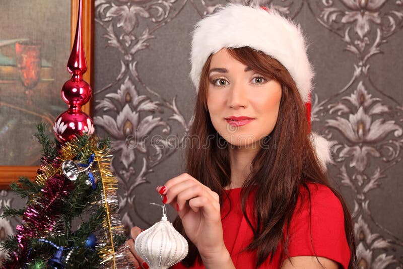 Beautiful Woman Decorating the Christmas Tree Stock Photo - Image of ...