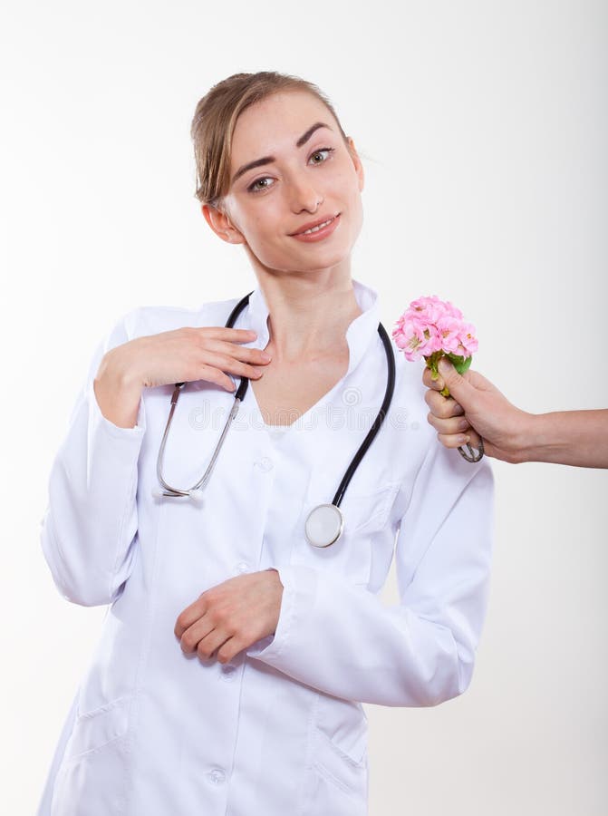 Beautiful Woman Doctor with a Flower. Stock Image - Image of happy ...