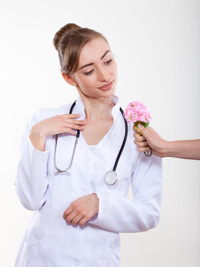 Beautiful Woman Doctor with a Flower. Stock Image - Image of nicely ...
