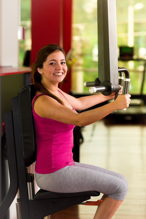 Beautiful Woman Doing Chest Exercises in Gym Stock Photo - Image of ...