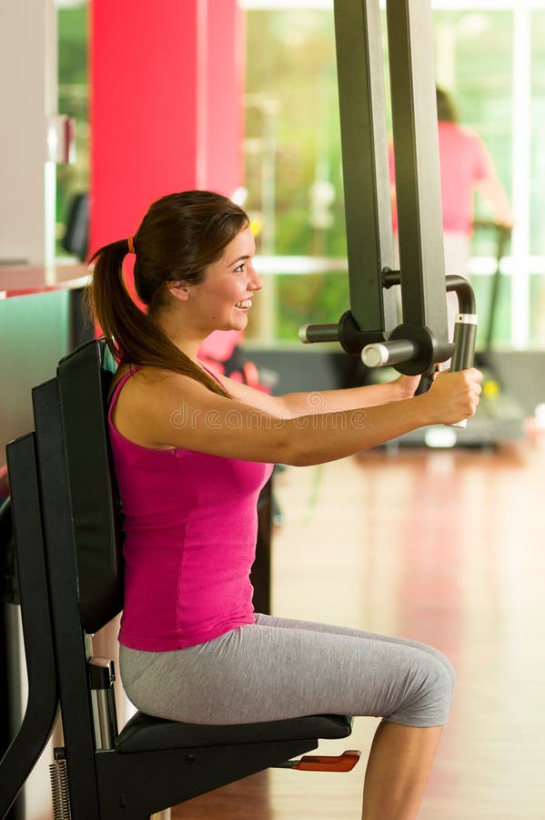 Beautiful Woman Doing Chest Exercises in Gym Stock Image - Image of ...