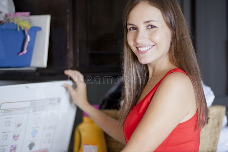 Beautiful Woman Doing Laundry Stock Photo - Image of smile, detergent ...