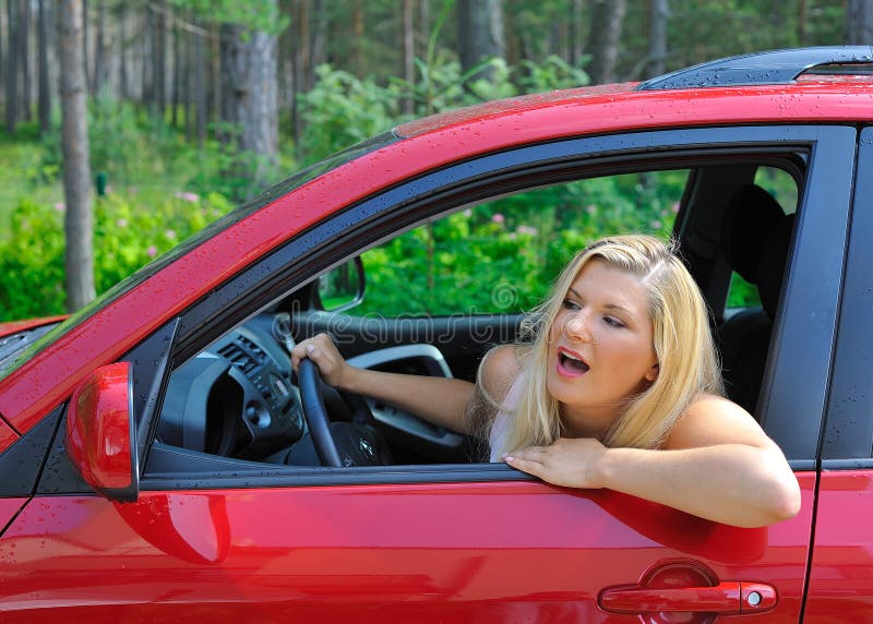 Beautiful Woman Driver in Red Shiny Car Outdoors Stock Image - Image of ...