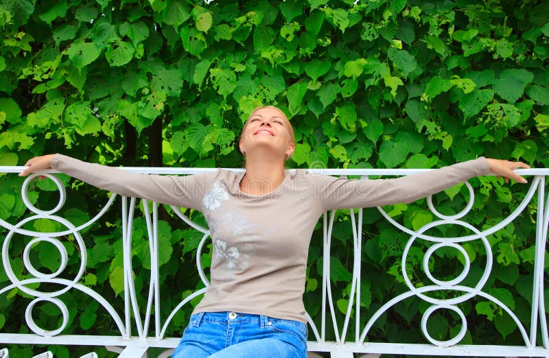 Beautiful Woman Enjoying the Sun on a Bench Stock Image - Image of ...