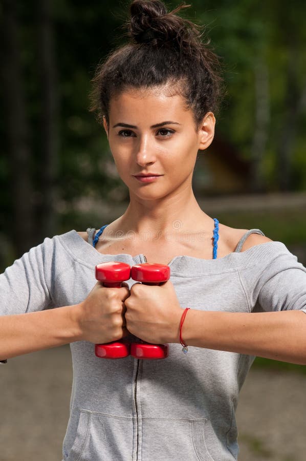 Beautiful Woman Exercising with Weights Stock Photo - Image of people ...
