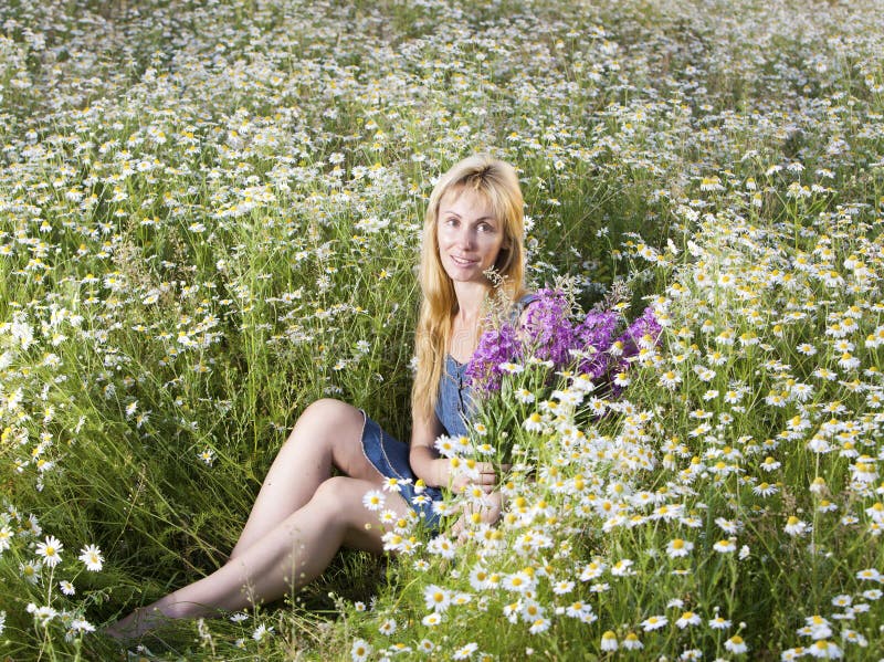 Beautiful Woman in the Field of Camomiles Stock Photo - Image of ...