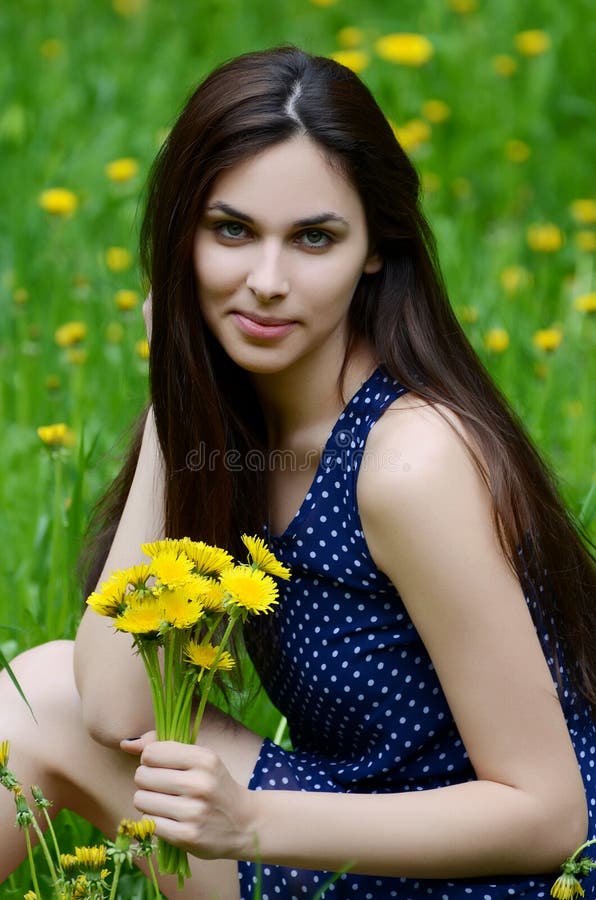 Beautiful Woman in the Field with Dandelions Stock Image - Image of ...
