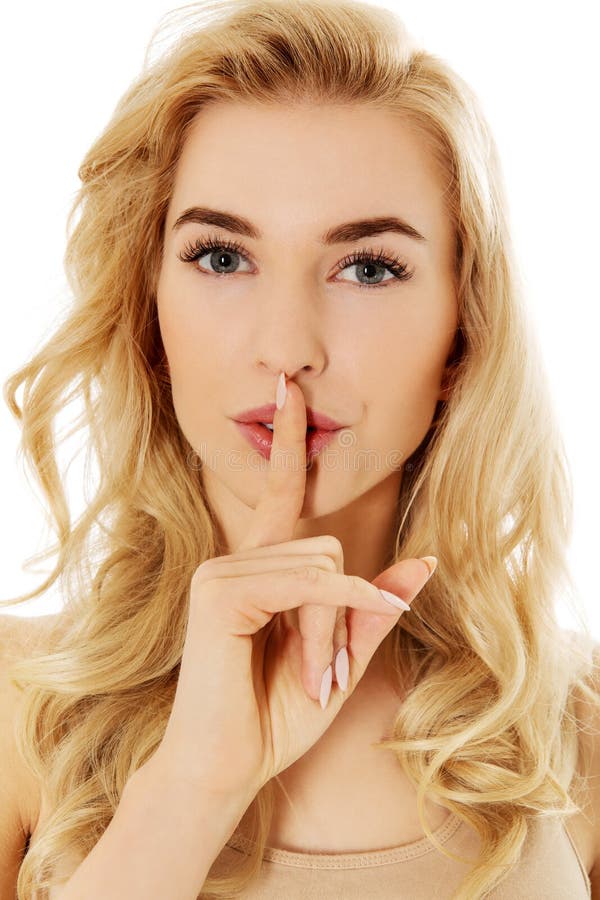 Beautiful Woman with Finger on Lips Stock Photo - Image of beautiful ...