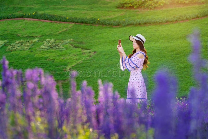 Beautiful Woman on a Flower Garden Stock Image - Image of color ...