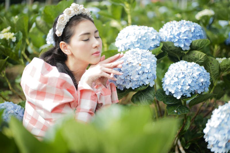 Beautiful Woman in the Flower Garden Stock Image - Image of beauty ...