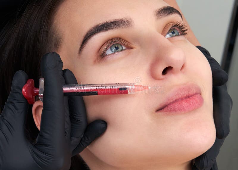 Beautiful Woman Gets an Injection in Her Face Stock Image - Image of ...