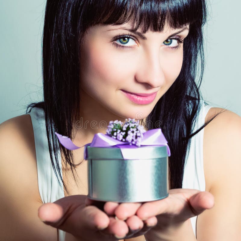 Beautiful Woman with a Gift in Their Hands. Stock Photo - Image of ...