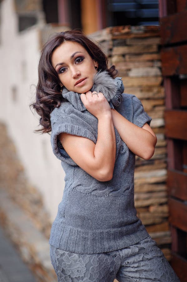 Beautiful Woman in a Gray Knitted Sweater for a Walk Stock Photo ...