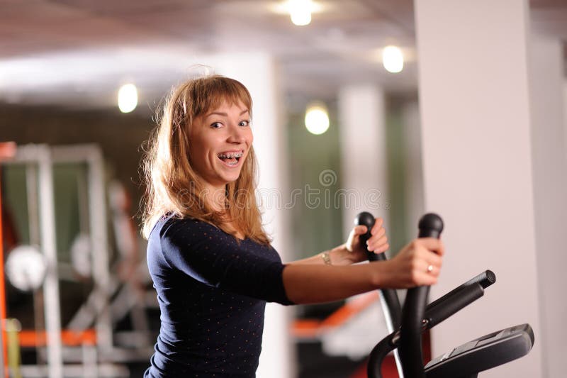 Beautiful woman at the gym stock photo. Image of attractive - 29108500