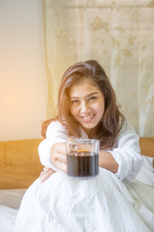 Beautiful Woman Have Coffee Stock Photo - Image of asian, tousled: 79665990