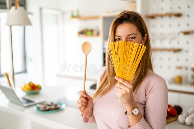 Beautiful Woman Having Fun in Kitchen at Home Stock Photo - Image of ...