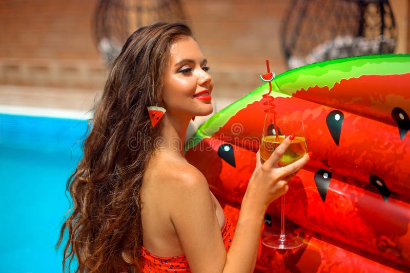 Beautiful Woman Holding Glass Coctail By Watermelon Float Mattress
