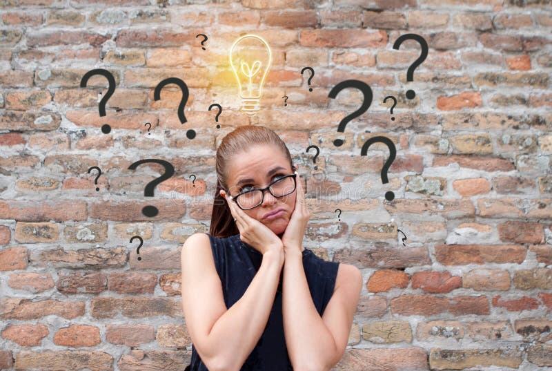 Beautiful Woman Holding Hand on Her Forehead and Thinking about Stock ...