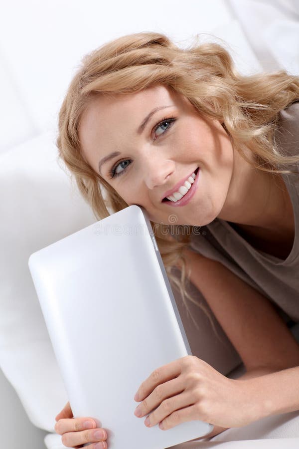 Beautiful Woman Holding Tablet Stock Photo - Image of blond, gorgeous ...