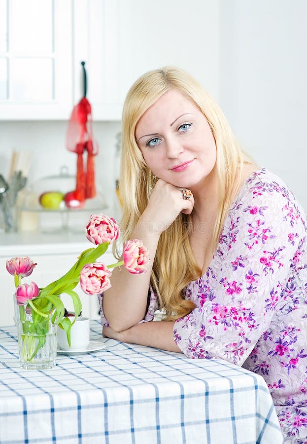 Beautiful woman at home stock image. Image of saucer - 23968345