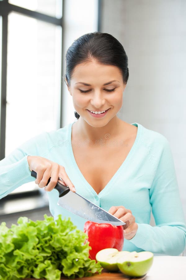 Beautiful Woman in the Kitchen Stock Photo - Image of knife ...