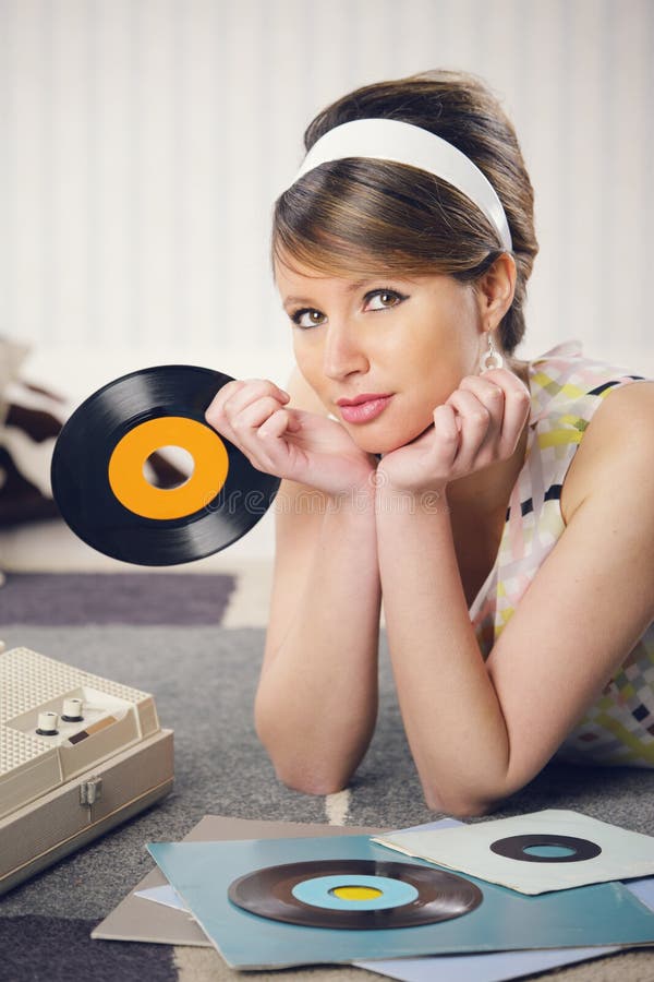 A Woman Listening To a Record Stock Photo - Image of player, woman ...