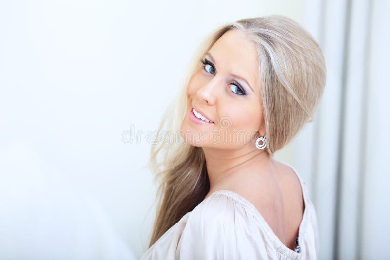 Beautiful Woman Looking Back Stock Photo - Image of beautiful, indoors ...